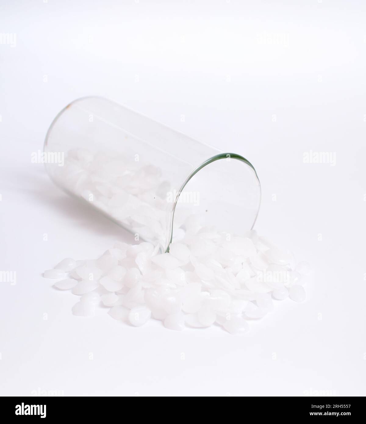 Potassium hydroxide or caustic potash on white background Stock Photo ...