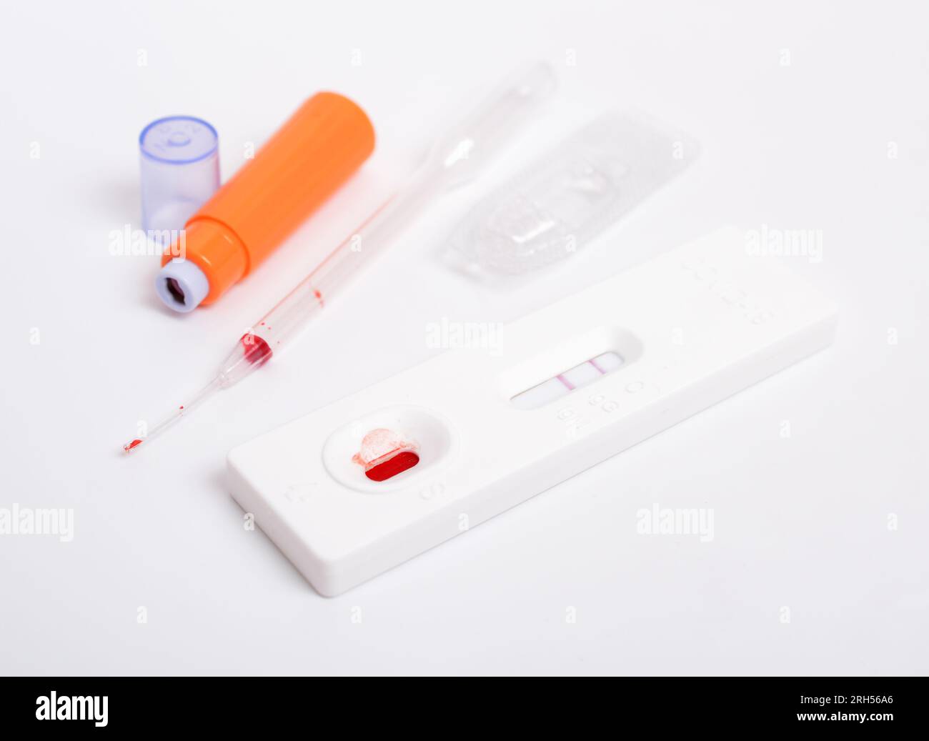 SARS COV 2 Antigen rapid test. Used, positive. On white background ...