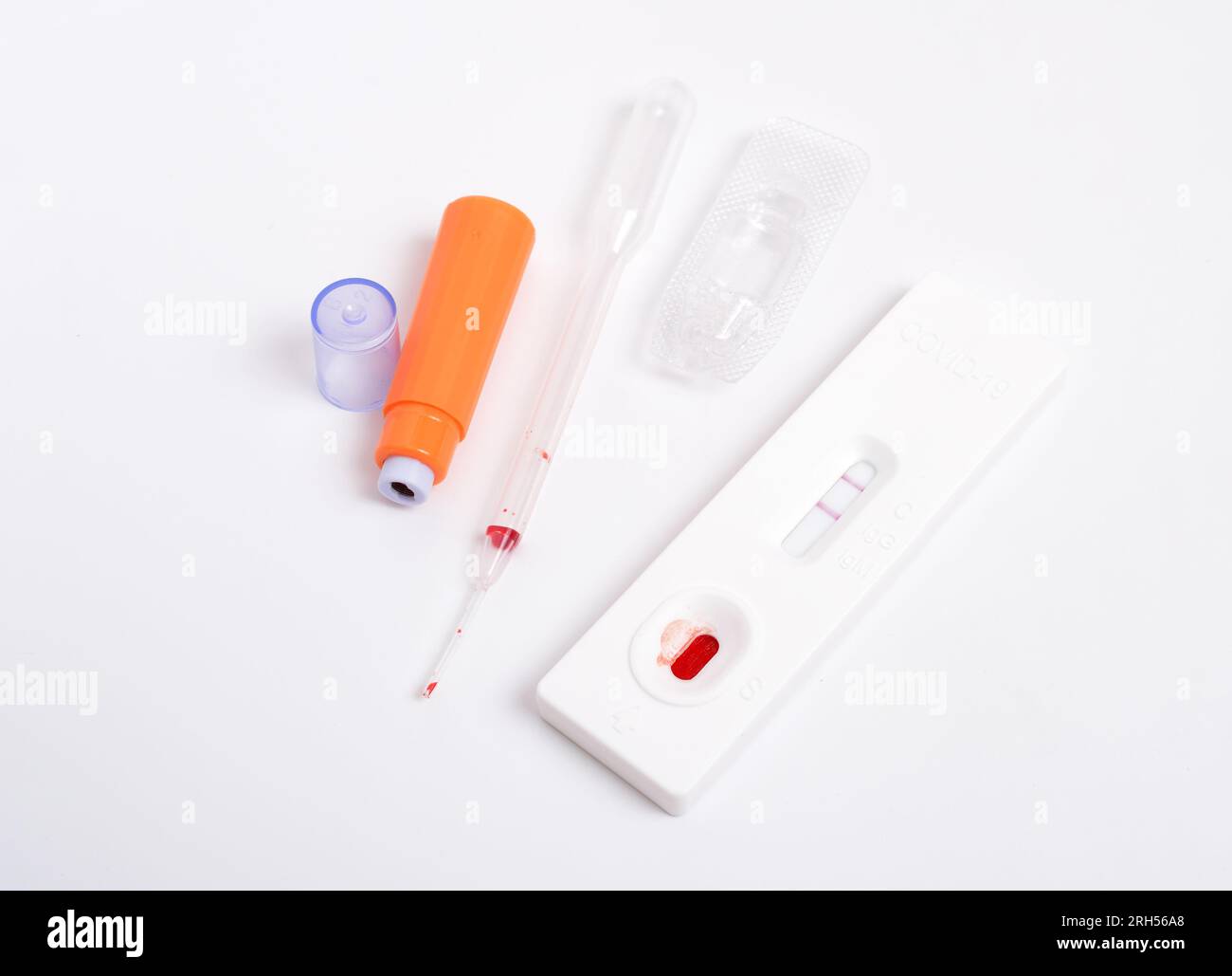 SARS COV 2 Antigen rapid test. Used, positive. On white background ...