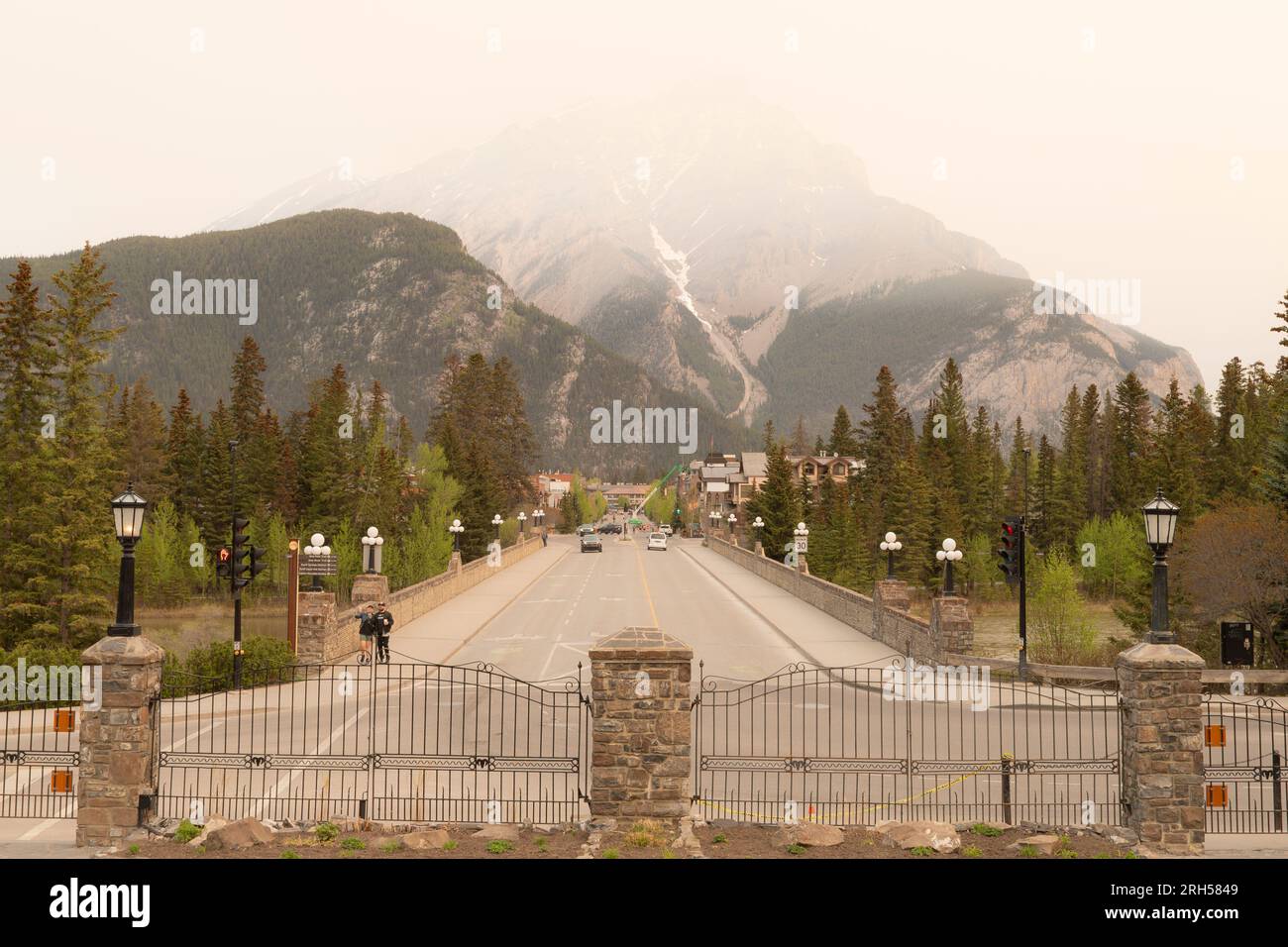 View looking down smokey Banff Avenue during wildfires. Cascade ...