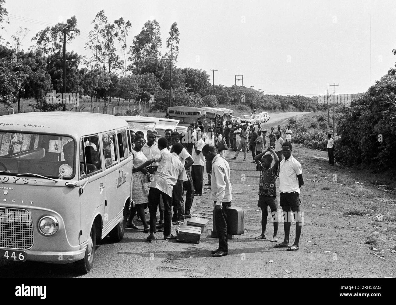 Biafran troops search cars on the road between the Niger River and ...