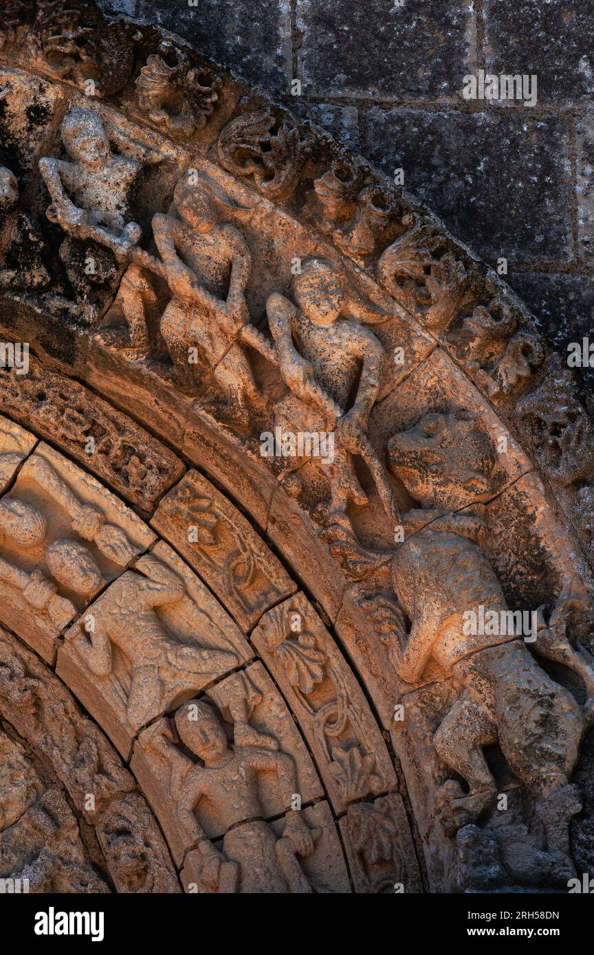Tug of war and trial of strength. Group of men haul up a lion tied by a ...