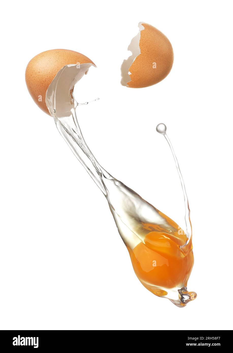 Cracked egg shell revealing egg yolk and white Stock Photo - Alamy