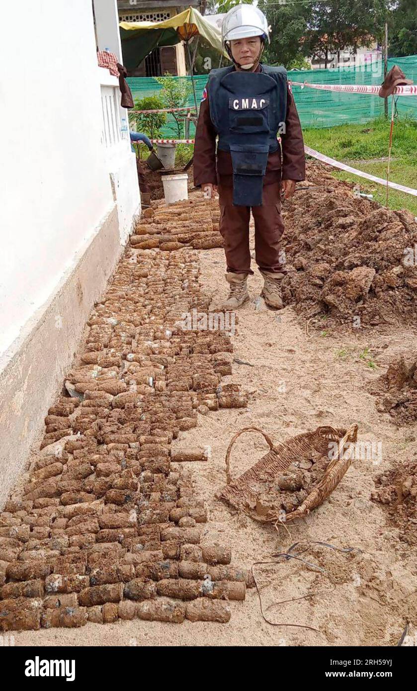 In this photo released by the Cambodia Mine Action Center, CMAC, a ...