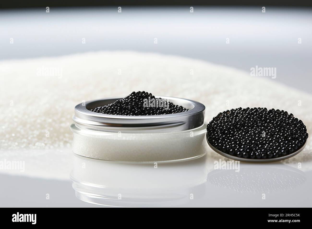 An exquisite caviar food composition on a clean white background ...