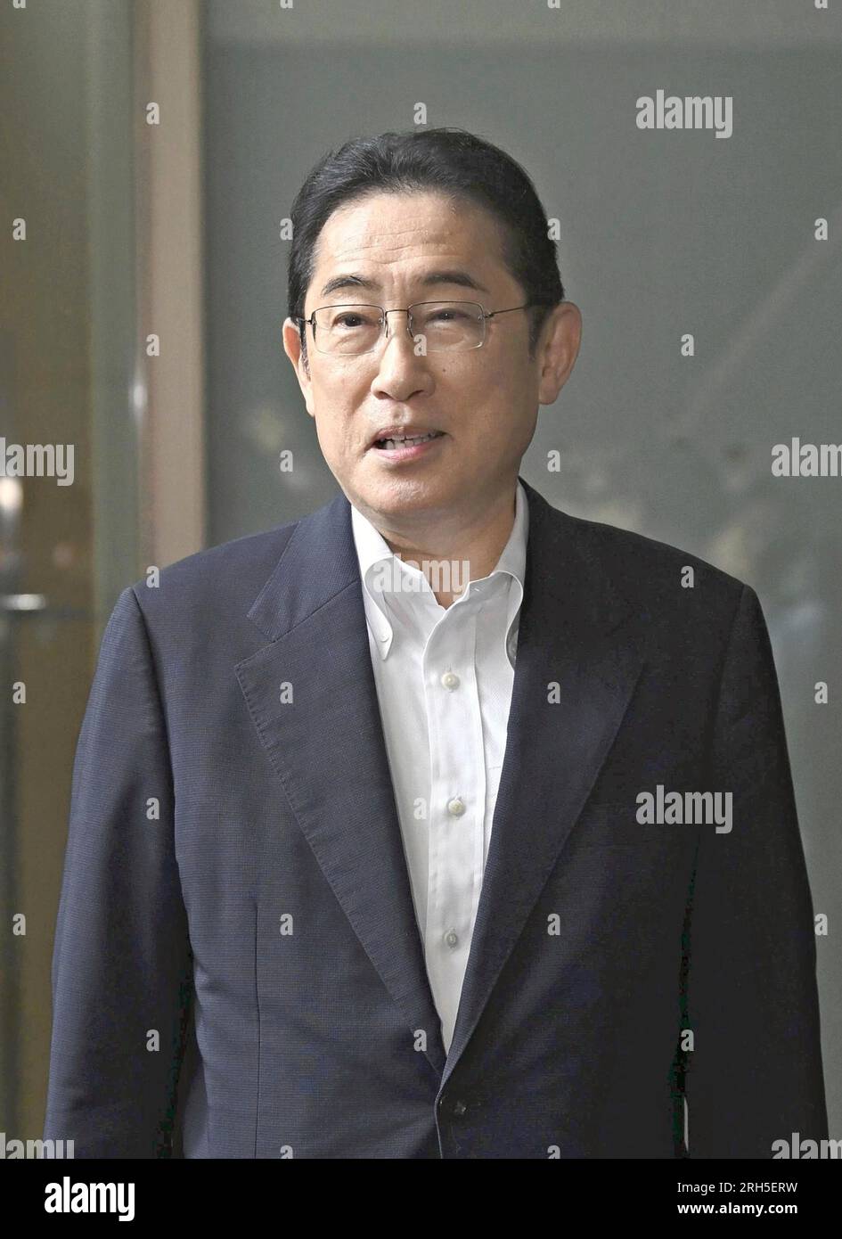 Japan's Prime Minister Fumio Kishida speaks to media after taking a large language model; LLM ...