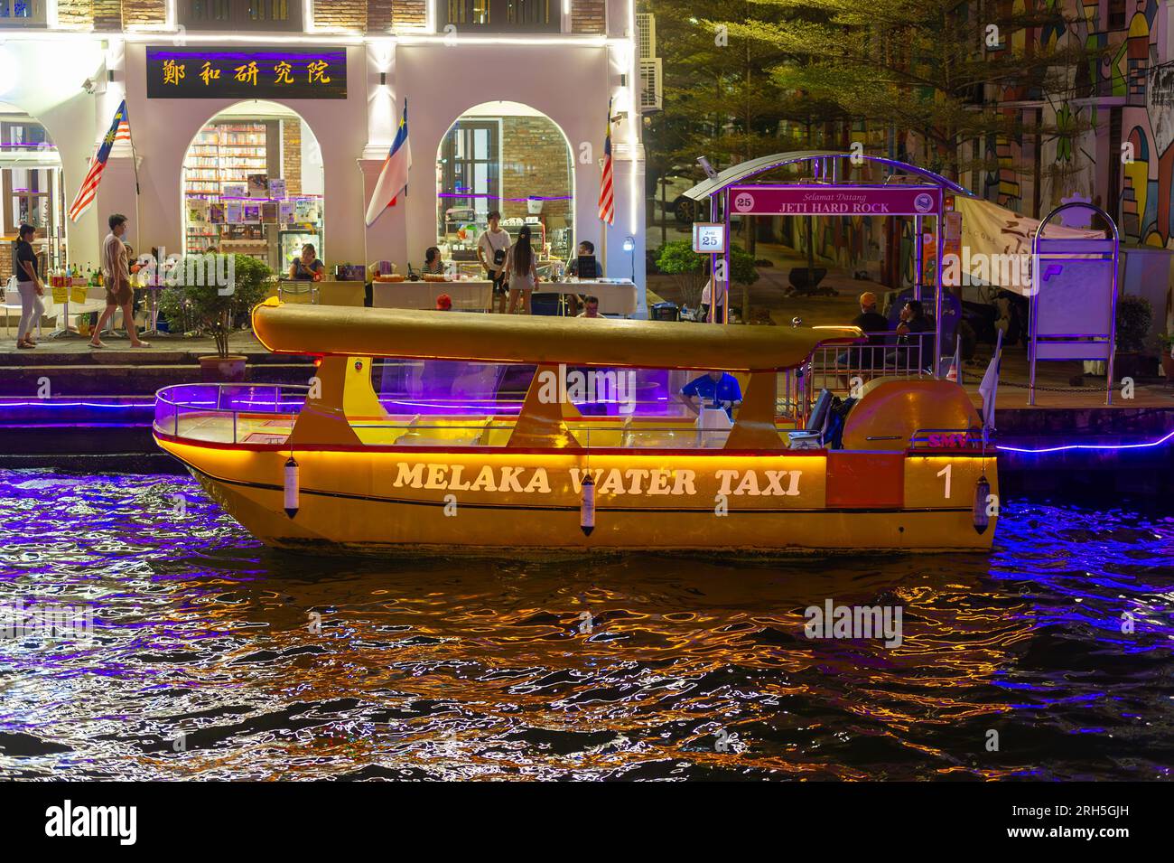 A Melaka Water Taxi on the Malacca River at night Stock Photo - Alamy
