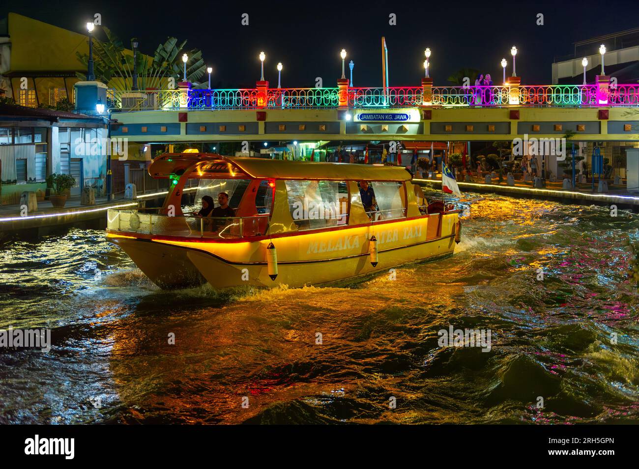 A Melaka Water Taxi on the Malacca River at night Stock Photo - Alamy