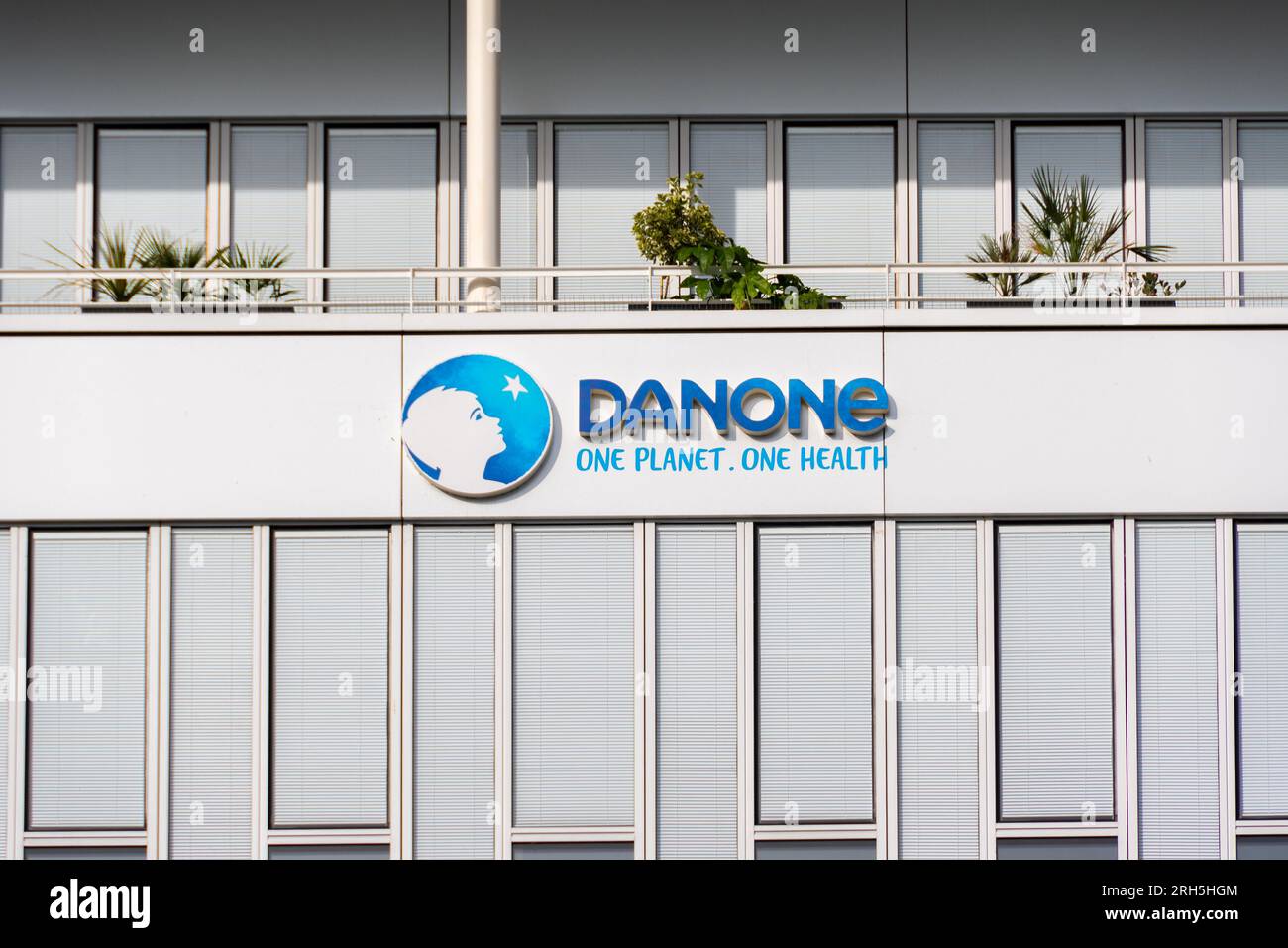 Sign and logo on the Danone headquarters building. Danone is a French ...