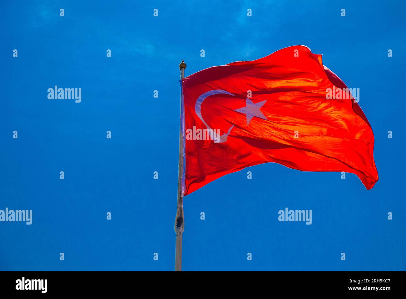 Turkish national flag with white star and moon in sky Stock Photo - Alamy