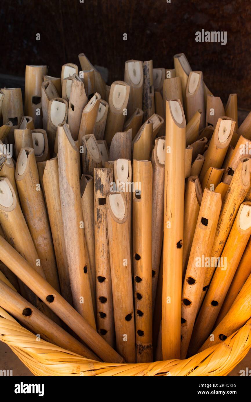Dozens of handmade wooden flutes in display Stock Photo - Alamy