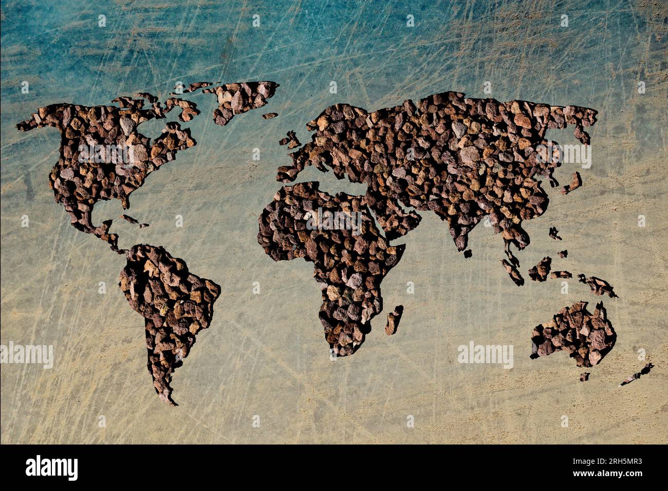 Roughly outlined world map withpebble rock background Stock Photo - Alamy