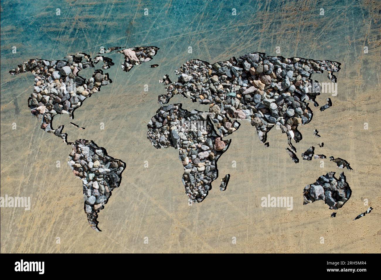 Roughly outlined world map withpebble rock background Stock Photo - Alamy