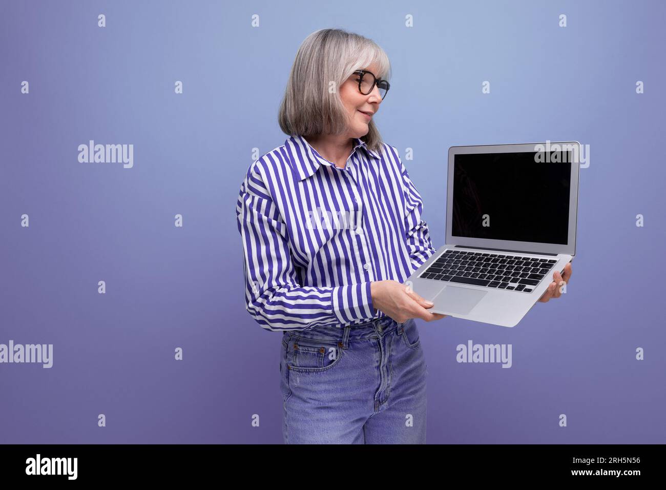 60s middle aged woman master remote professions online using laptop on ...