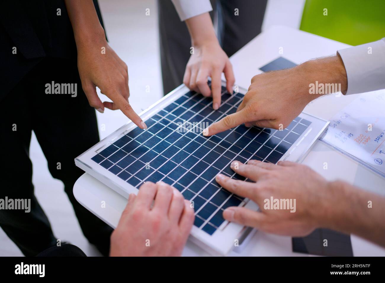 Vendor is meeting for solar panel. Environment and clean energy concept ...