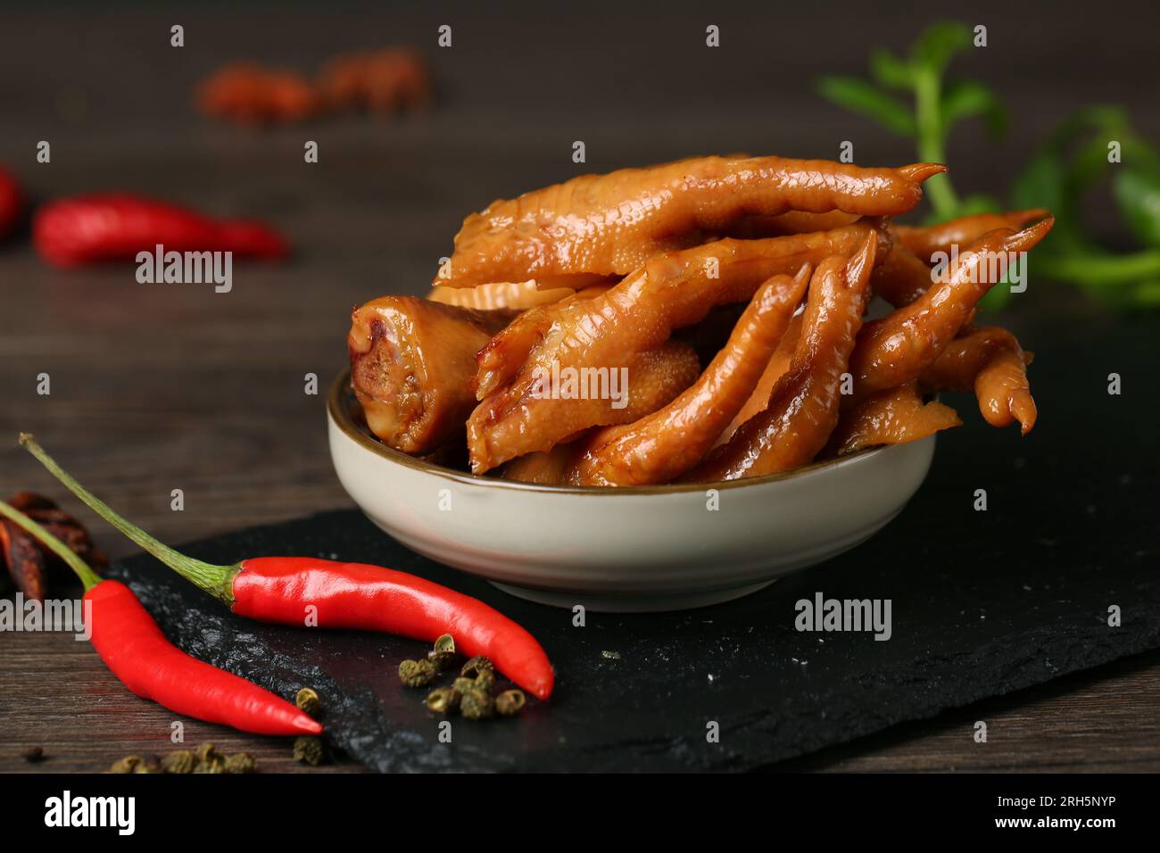 Marinated Chicken Feet in Spiced Sauce Stock Photo - Alamy