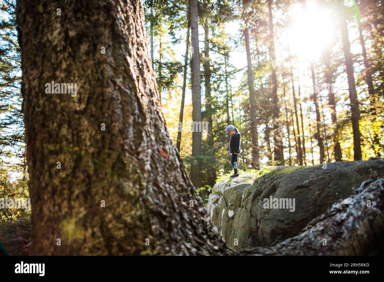 Young girl exploring nature, adventurous spirit Stock Photo - Alamy