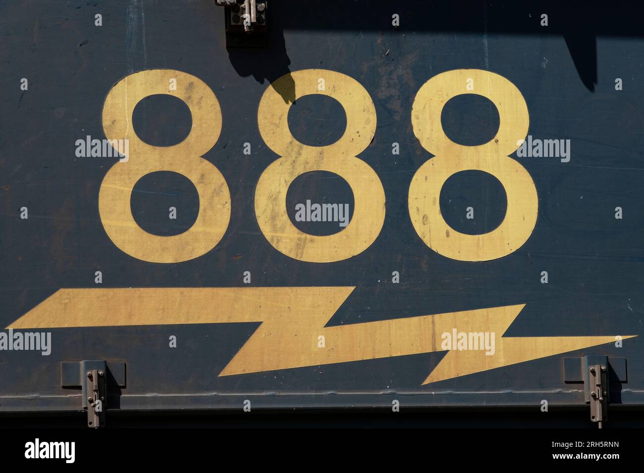 Detail of three 8s and a lightening bolt on a train locomotive Stock ...
