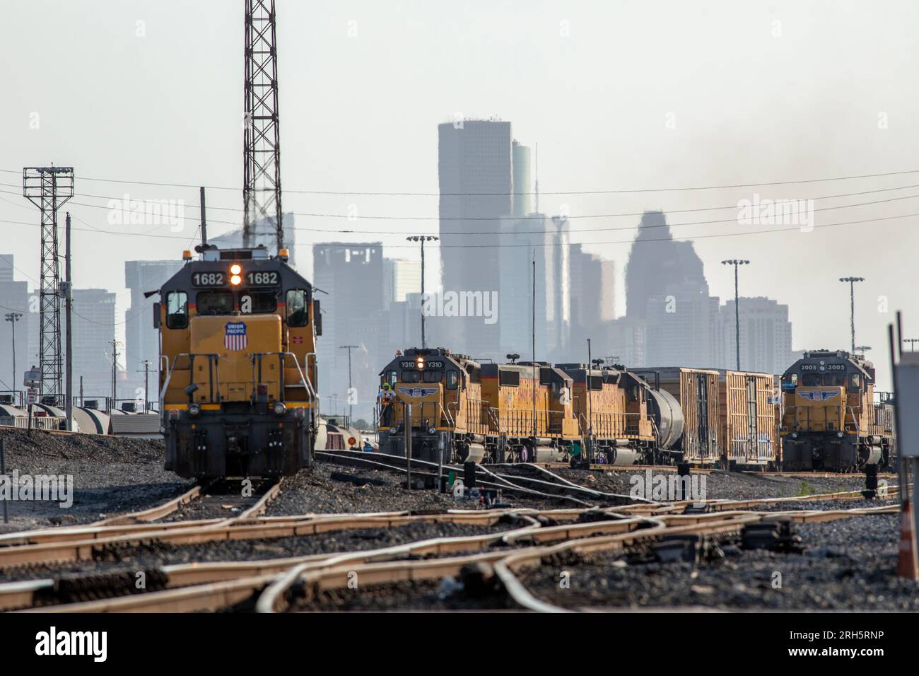 Trains switching cars in a yard near Houston Stock Photo - Alamy