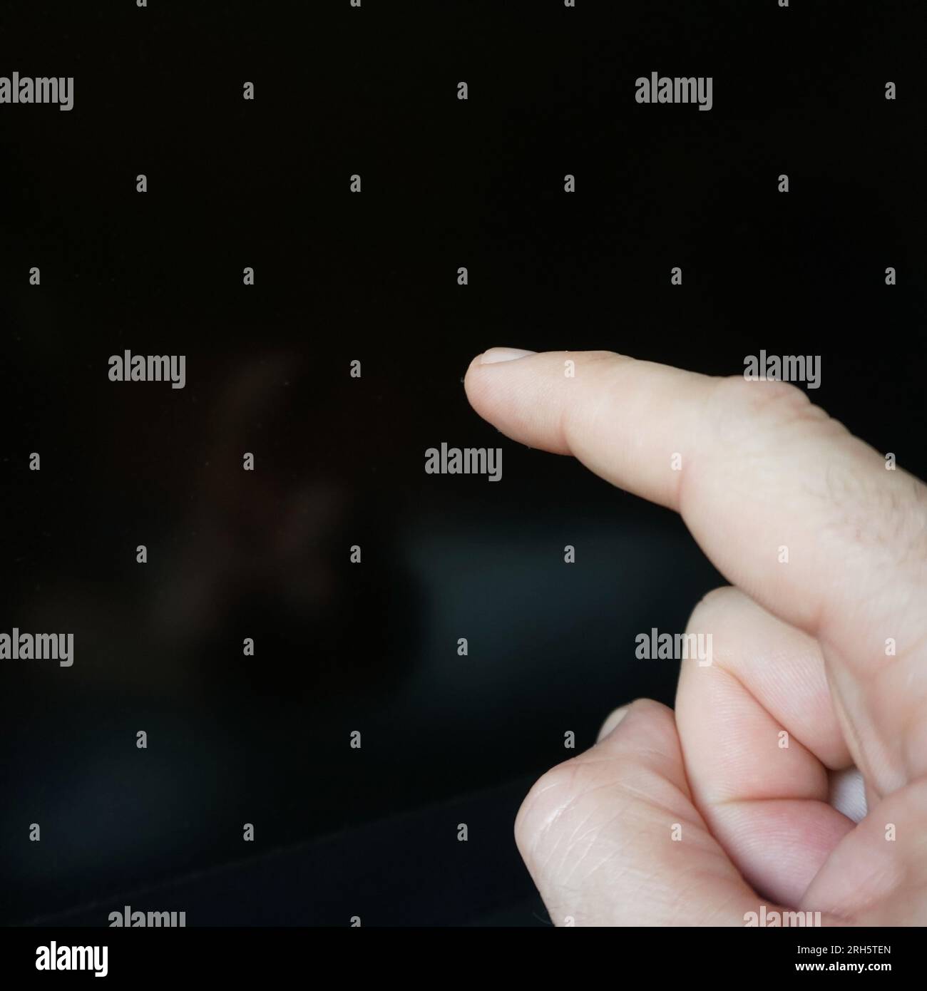 index finger pointing at digital screen to turn on the screen Stock ...