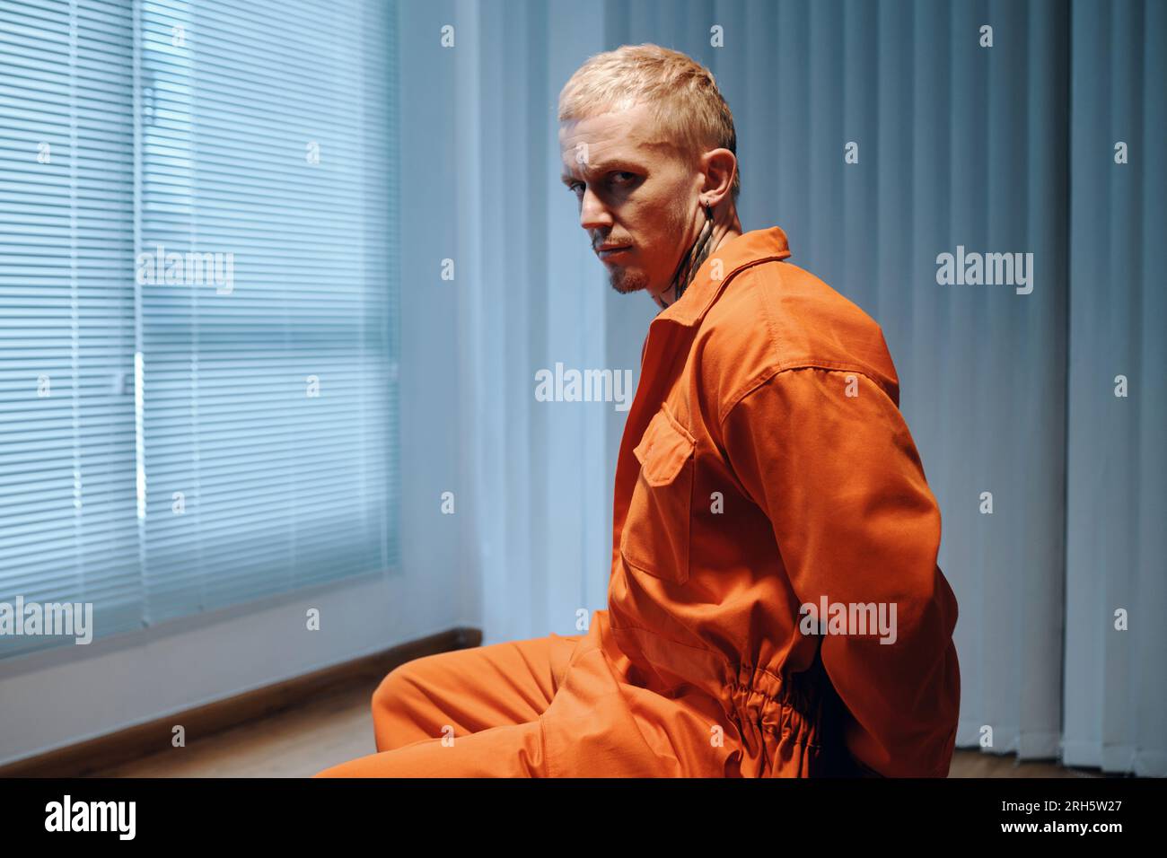 Prison uniform orange hi-res stock photography and images - Alamy