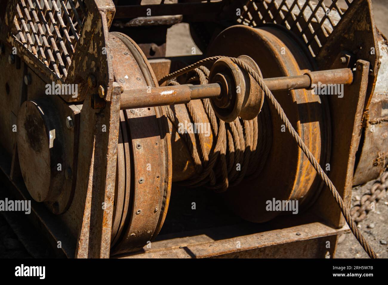 Rusty driving gears with metallic chain on a old mine train wagon for ...