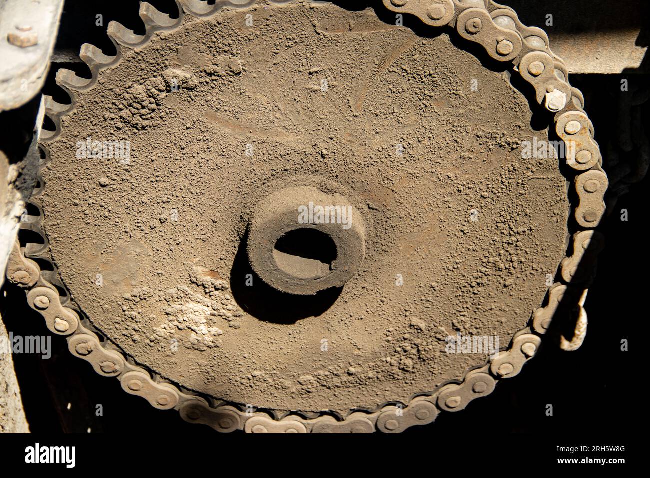 Rusty driving gears with metallic chain on a old mine train wagon for ...