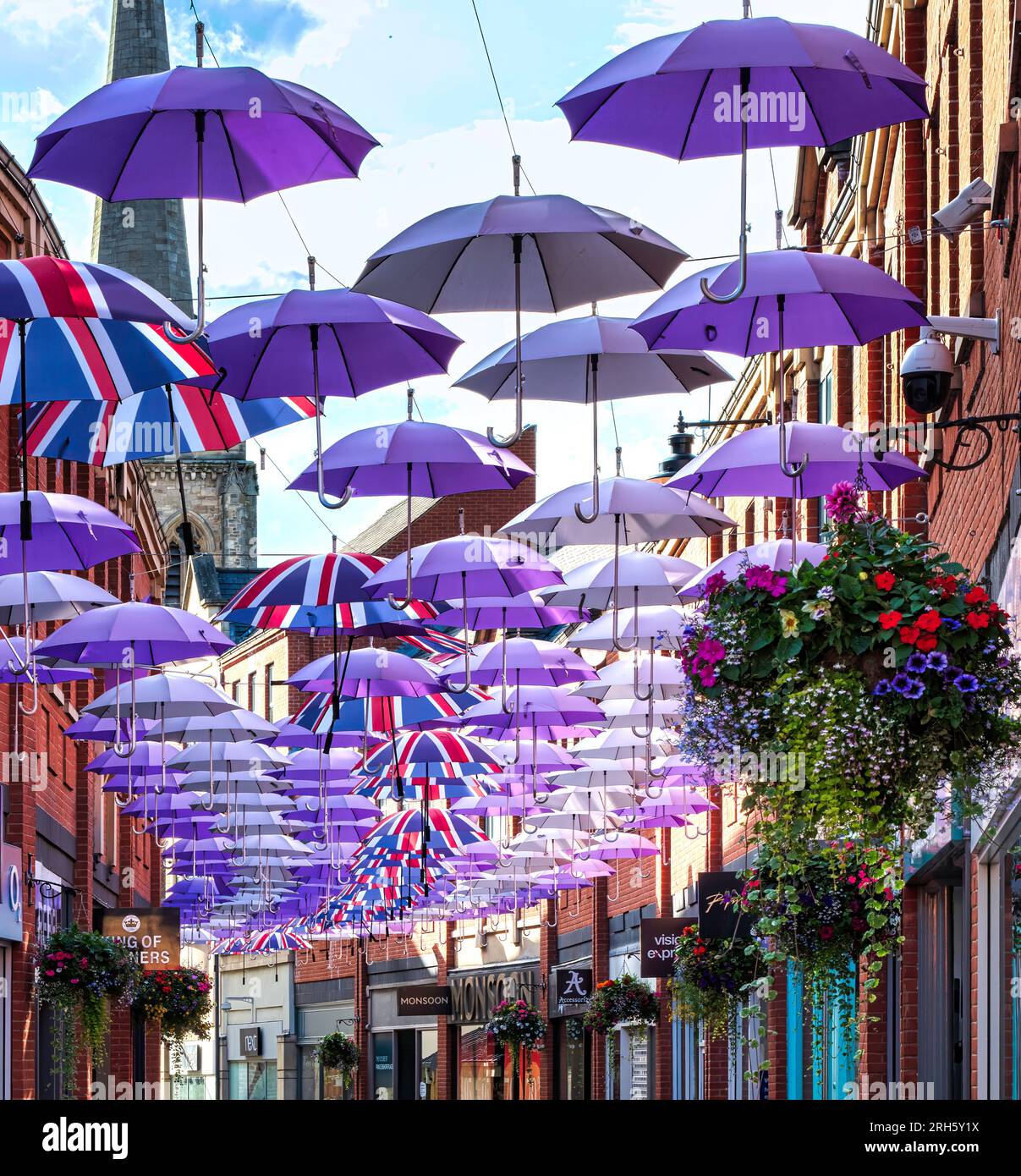A view of the hanging umbrellas on a sunny evening in Prince Bishops ...