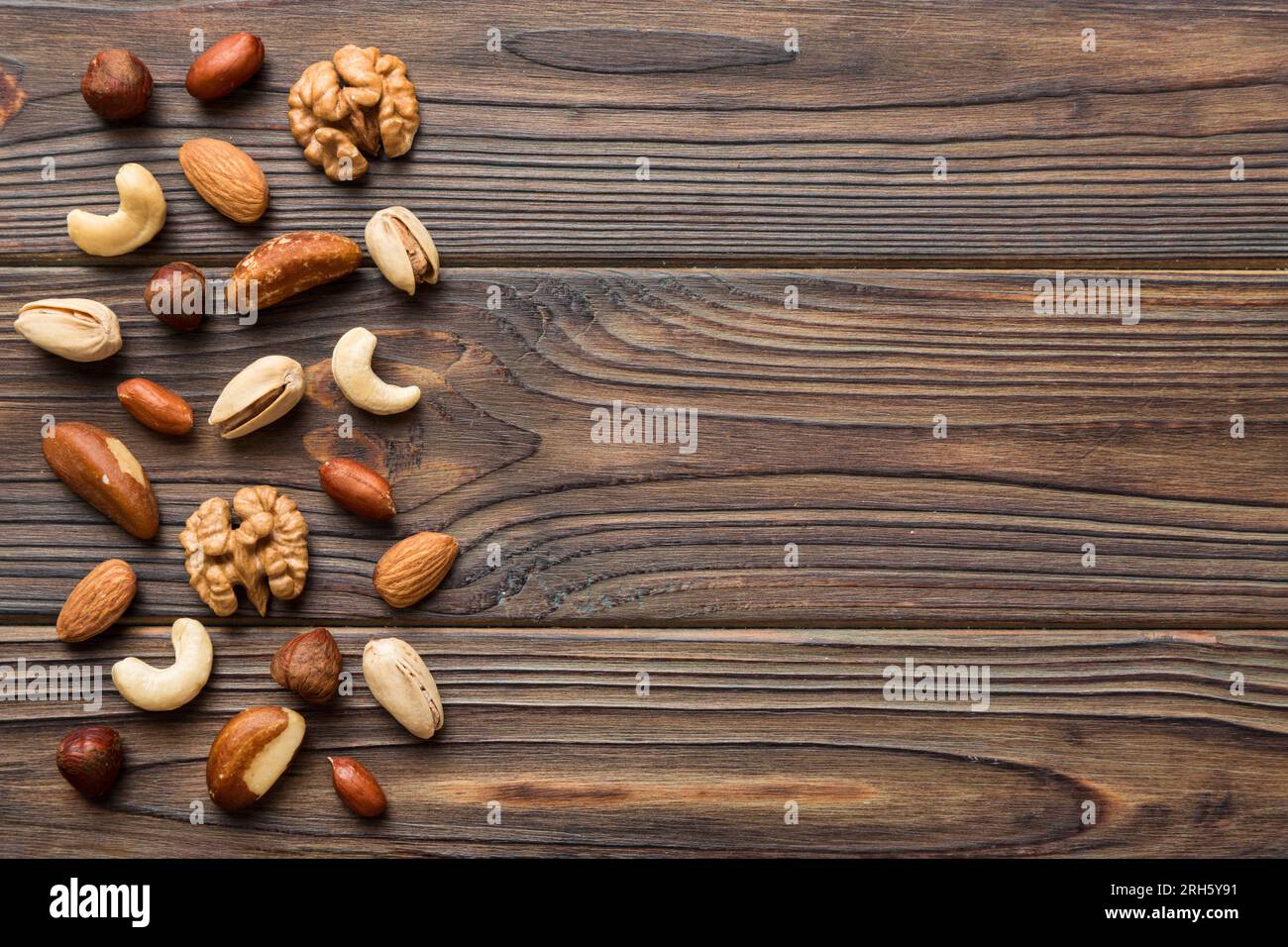 Composition of nuts , flat lay - mix hazelnuts, cashews, almonds on ...