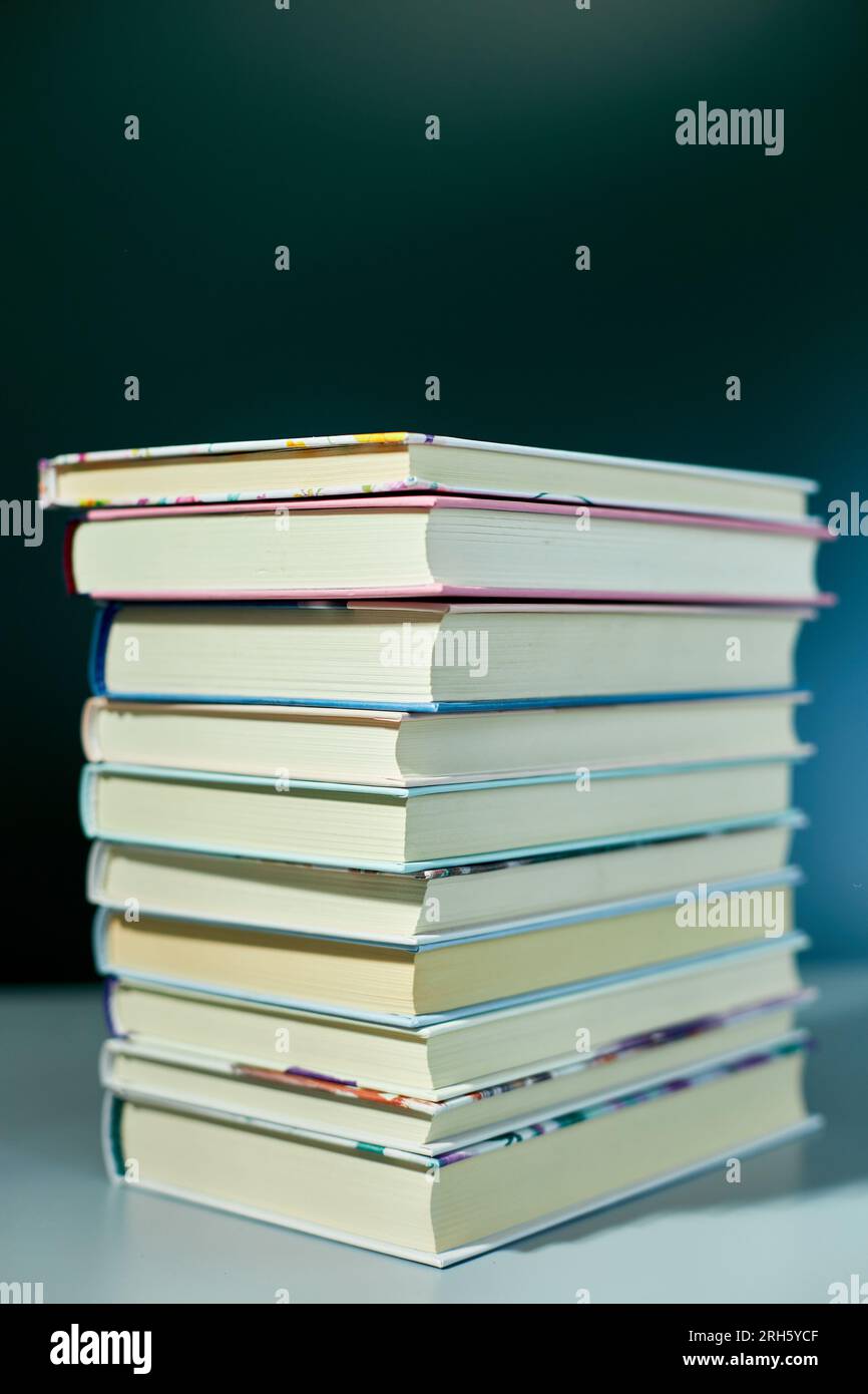 Stack of books on dark backgrounds, World book day, knowledge and ...