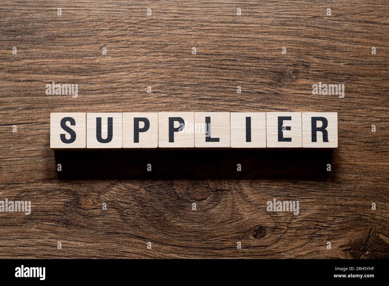 Supplier - word concept on building blocks, text Stock Photo - Alamy