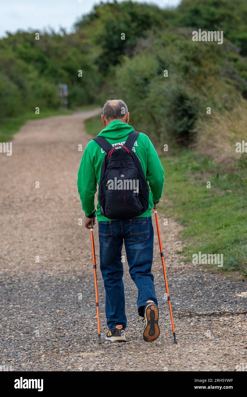Walking using sticks hi-res stock photography and images - Alamy