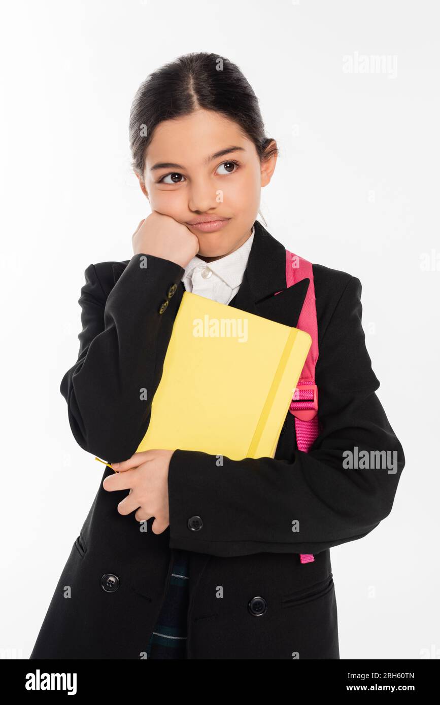 bored schoolgirl standing with notebooks isolated on white, back to ...