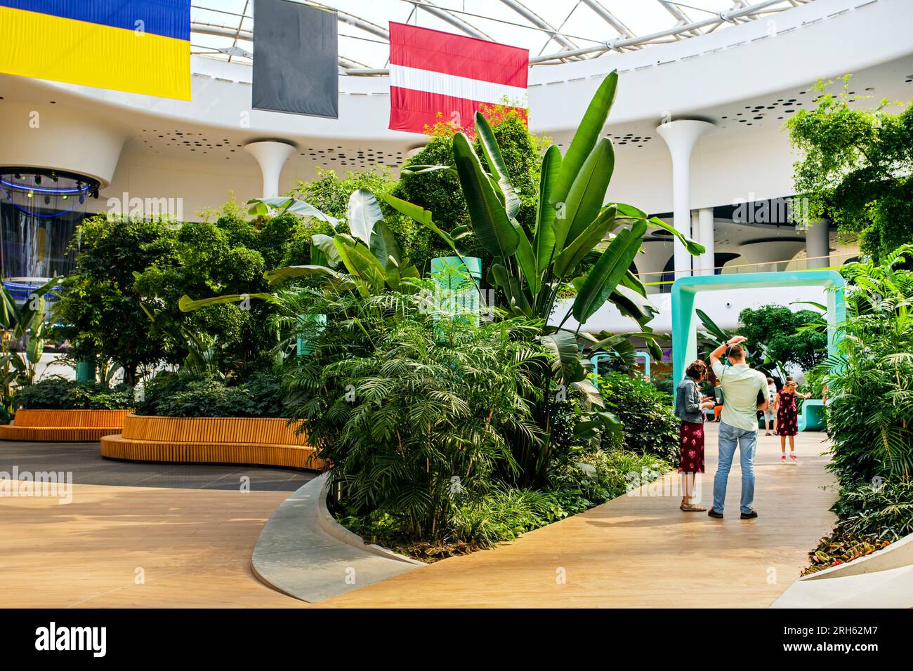 beautiful stylish interior with living plants in a shopping center ...