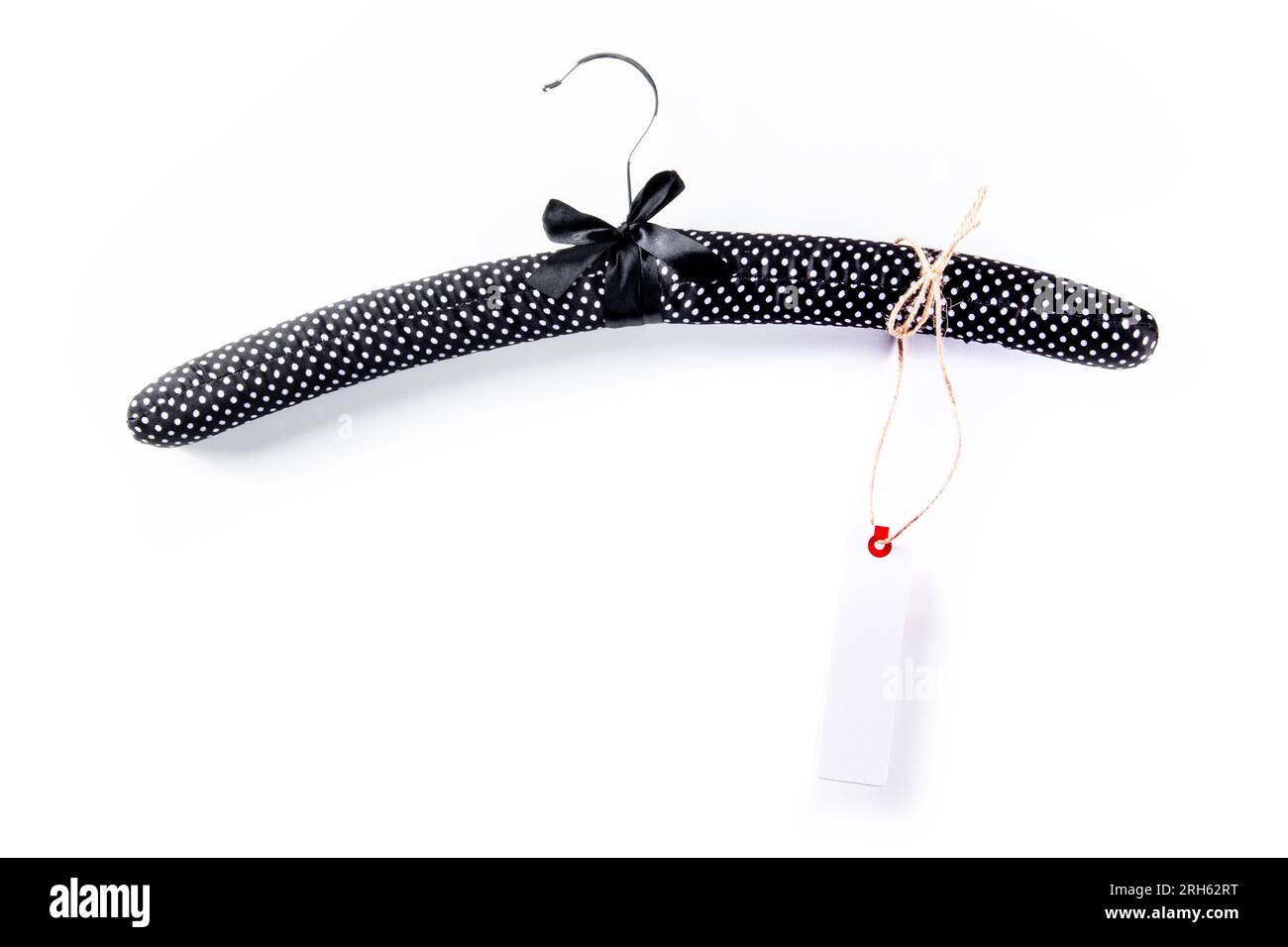 A satin padded hanger with a price tag, the concept of a fashion ...