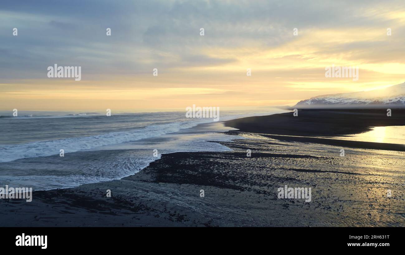 Aerial view of icelandic ocean with black sand beach in icelandic ...