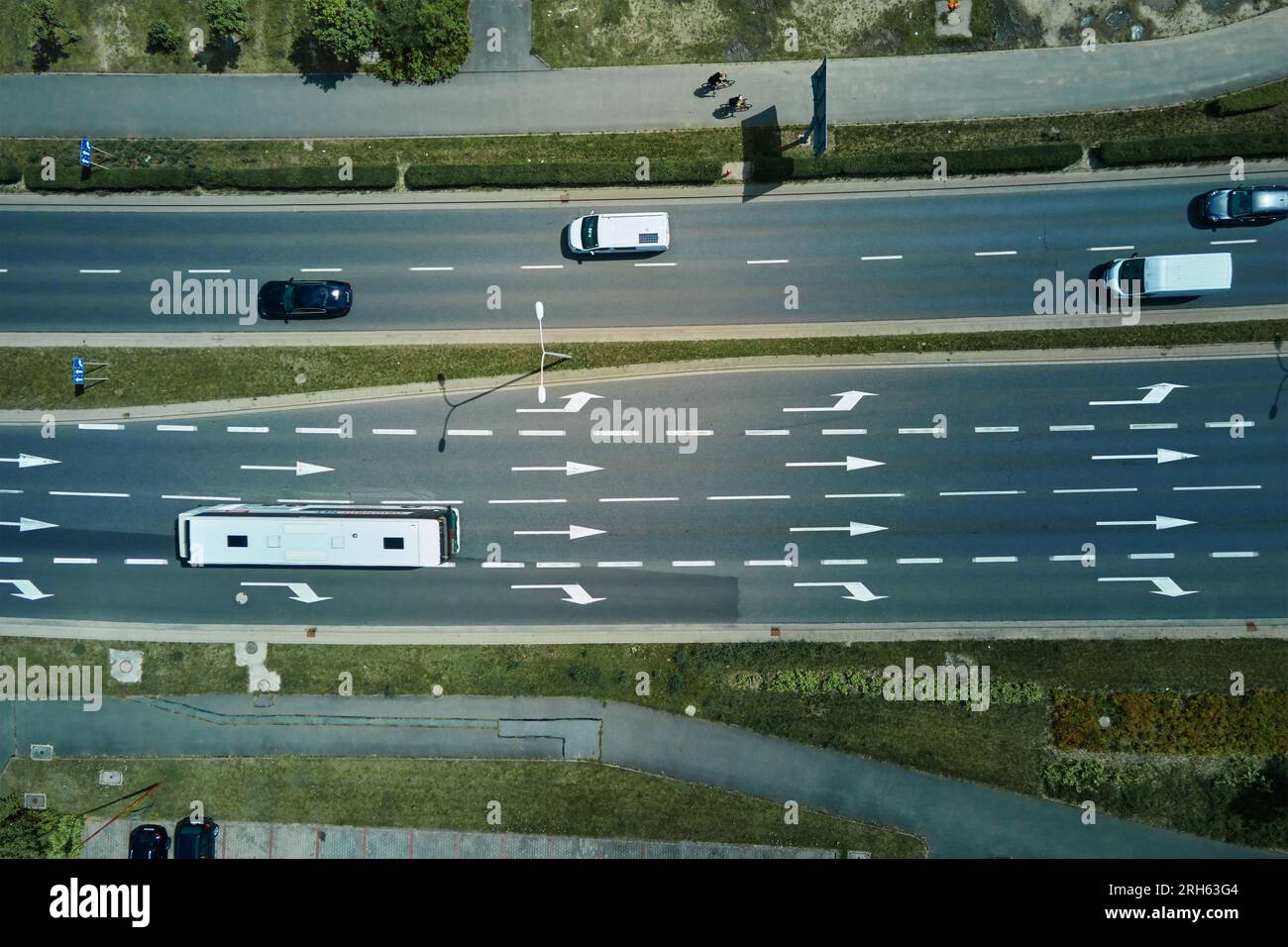 Car moving on road intersection and crossing lanes. City infrastructure ...