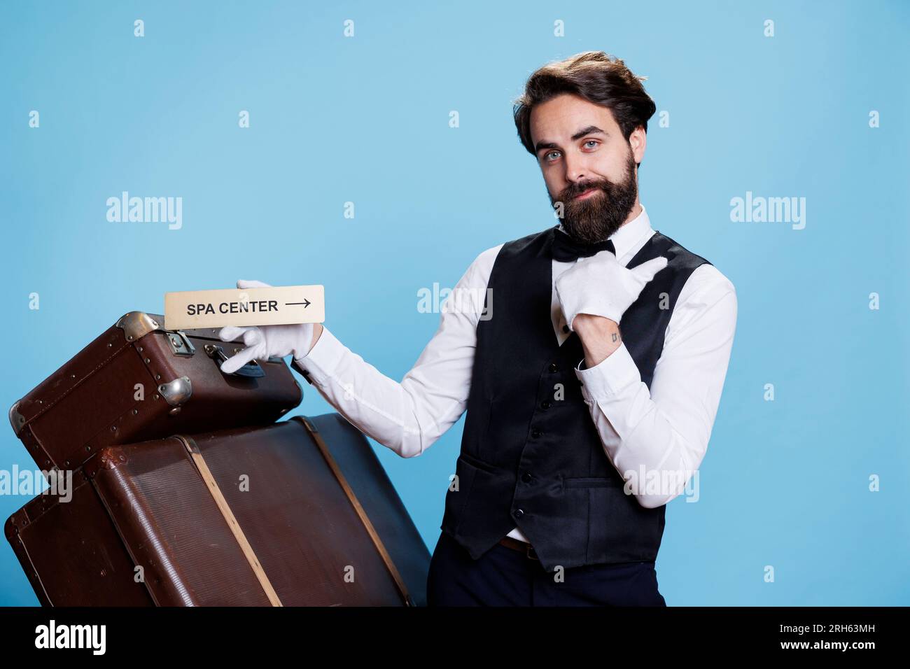 Hotel employee works in travel sector and leads visitors to the ...