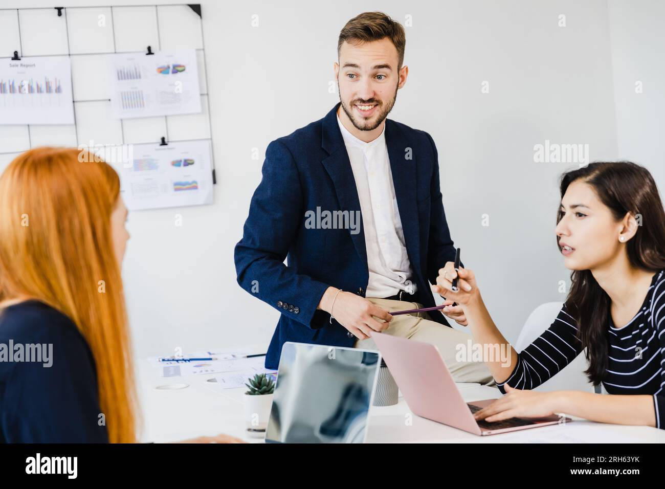 Confident business people work cooperate with diverse team at office ...