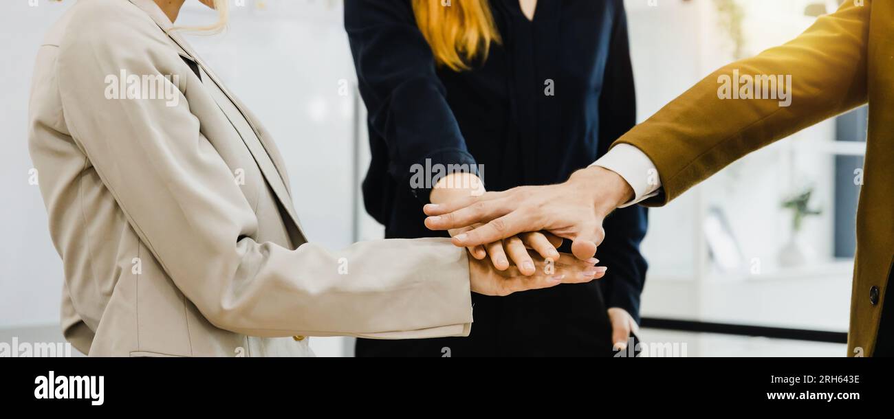 business people putting their hands together, Stack of hands. Unity and teamwork concept Stock ...