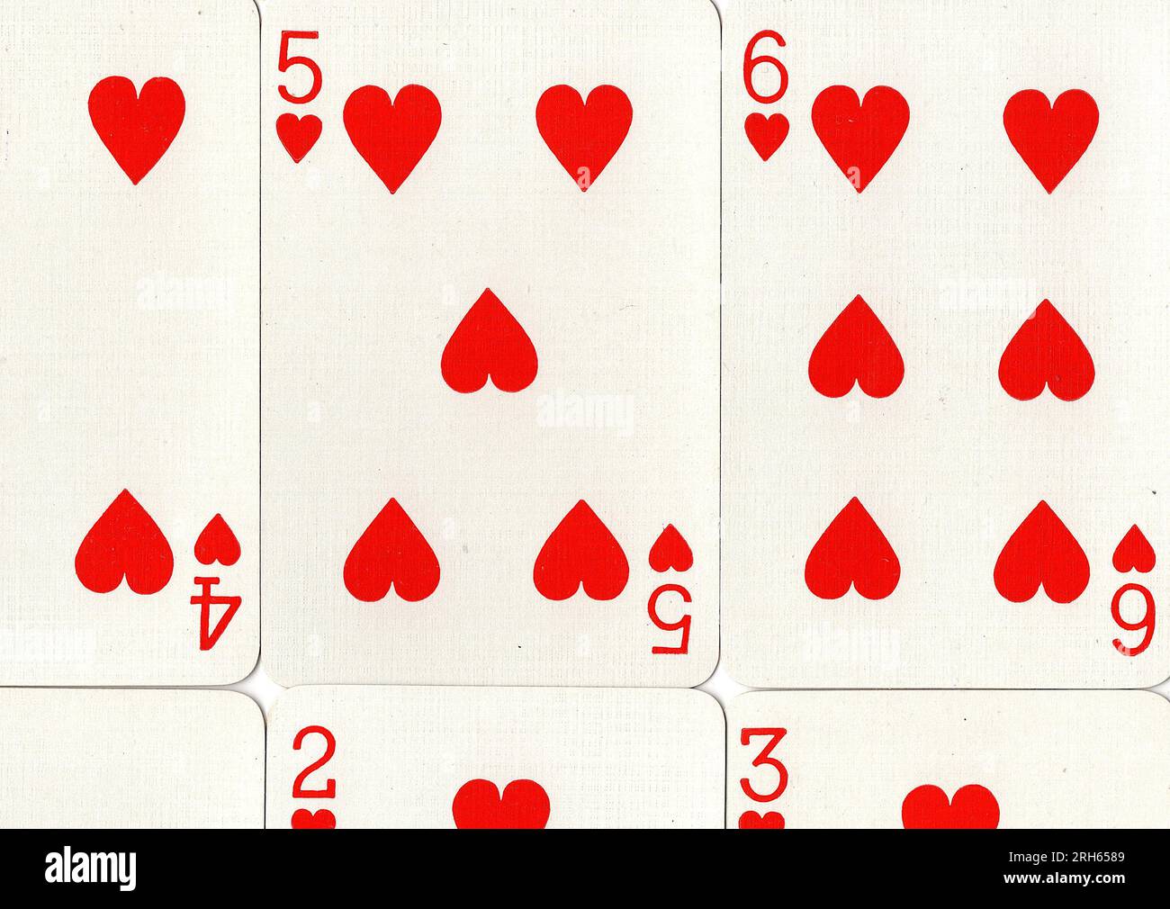 Vintage playing cards showing an ace to six of hearts Stock Photo - Alamy