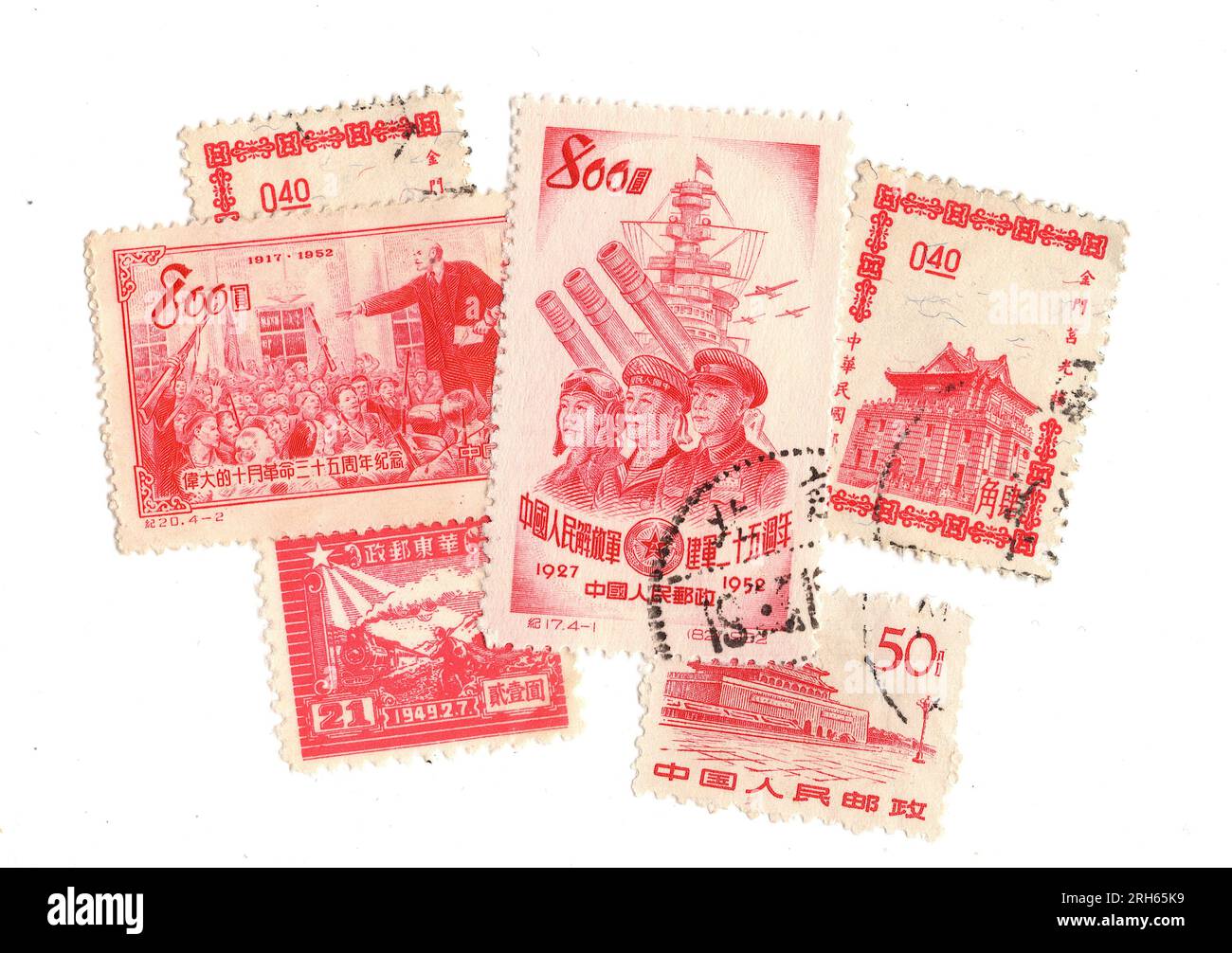 A montage of red vintage postage stamps from China on a white ...