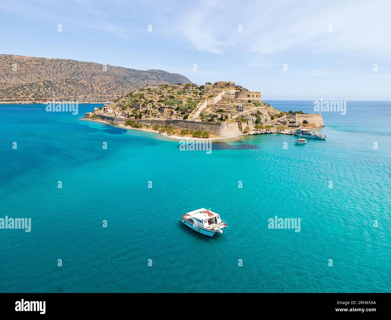Aerial drone view of Spinalonga island with calm sea. Old venetian ...