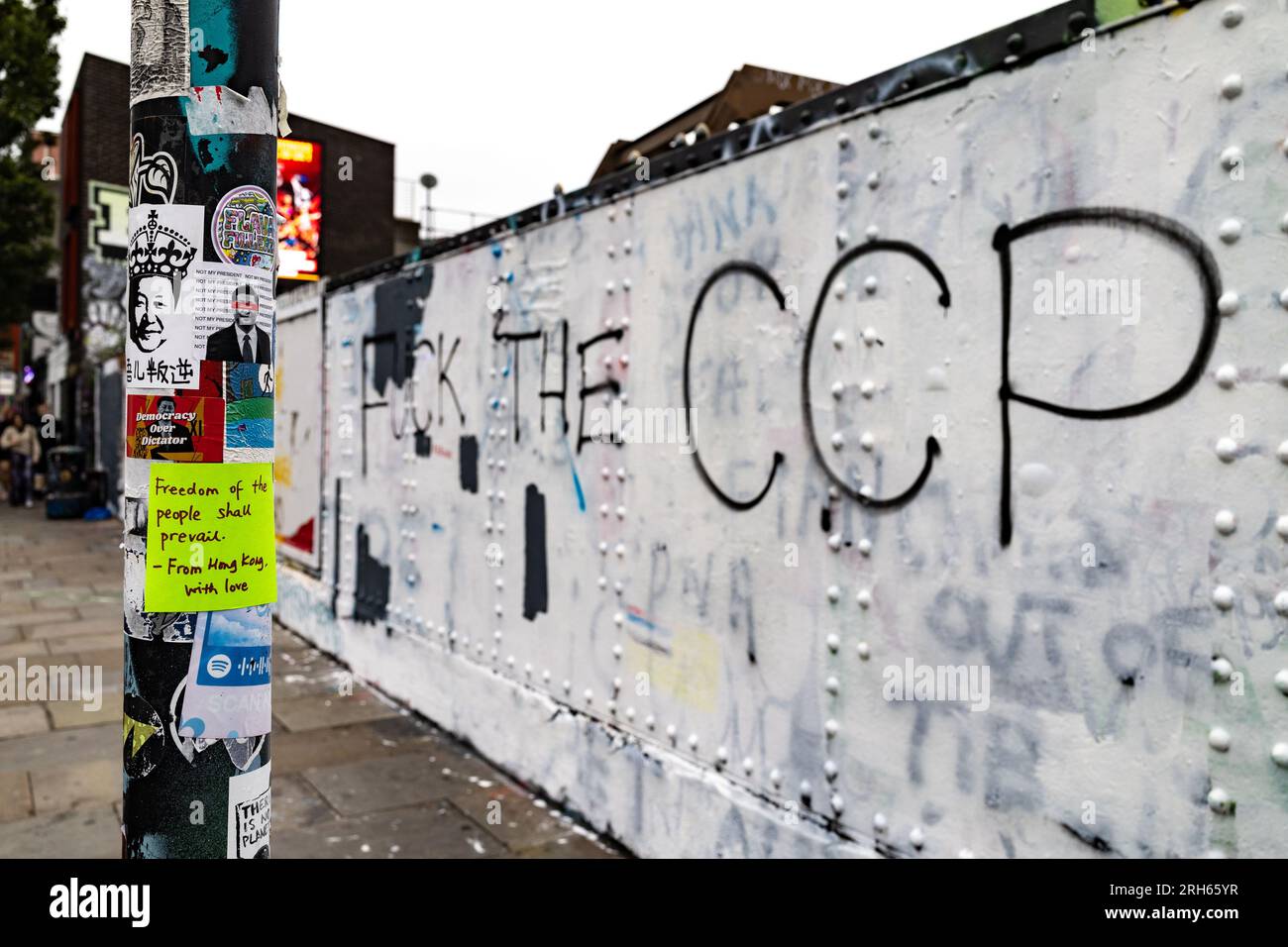 Anti-Beijing counter-slogans are seen in Brick Lane. "Brick Lane in ...