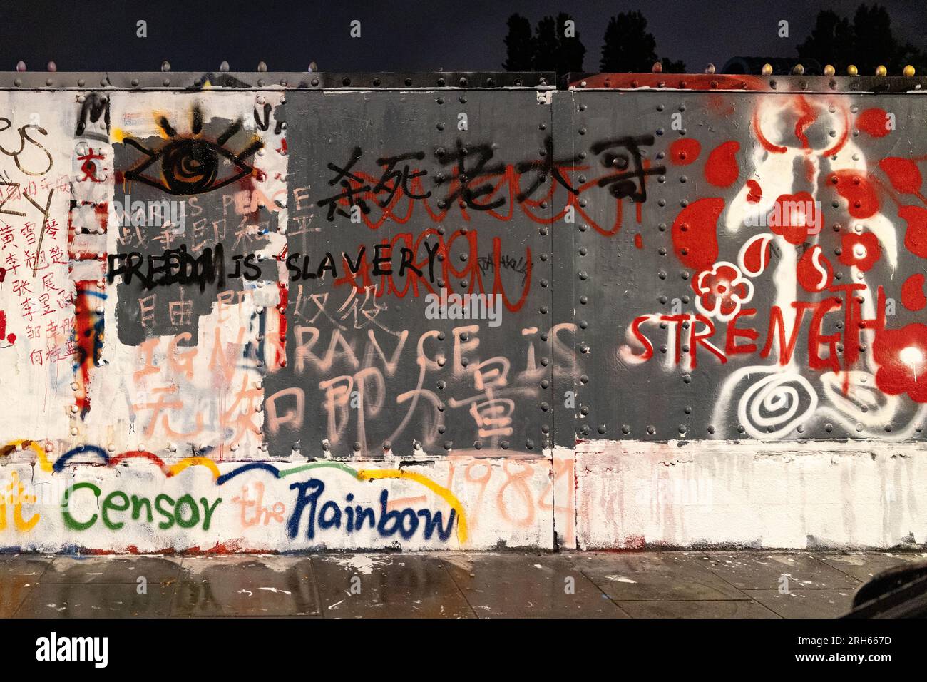 Anti-Beijing counter-slogans are seen in Brick Lane. "Brick Lane in ...