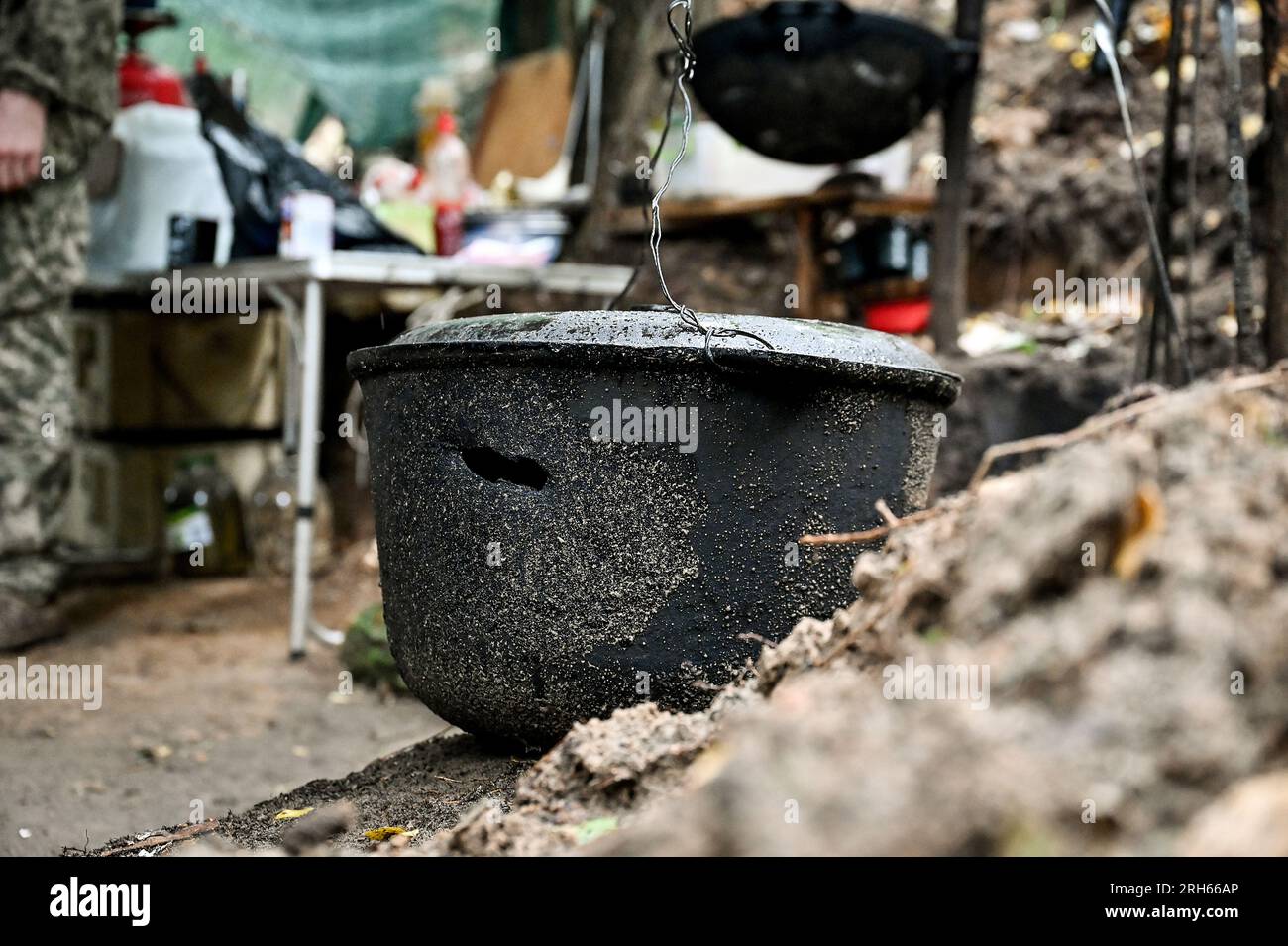 UKRAINE - AUGUST 11, 2023 - A pot covered in soot is pictured as the ...
