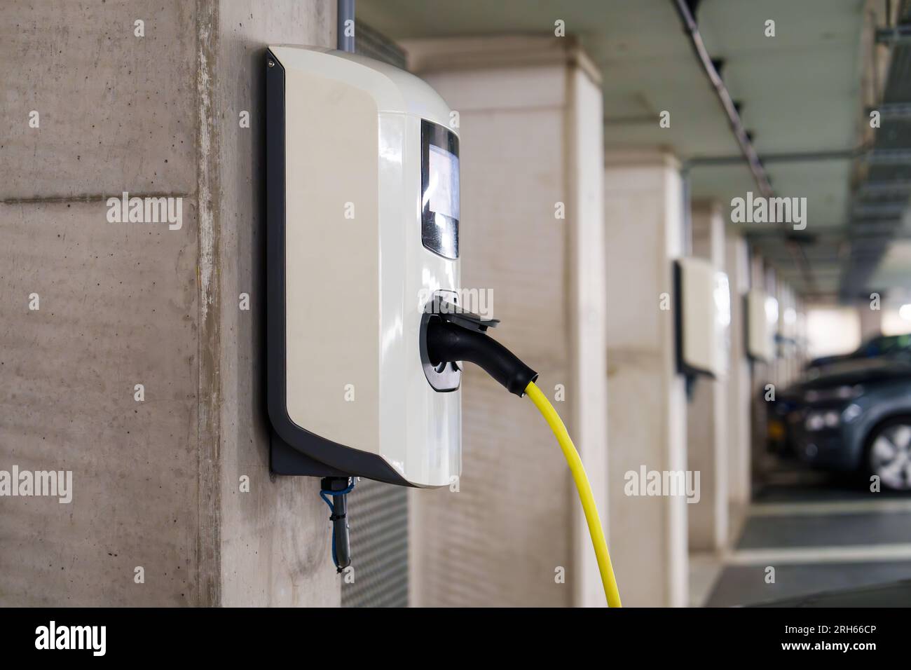 Recharging electric cars at the charging station in the underground ...