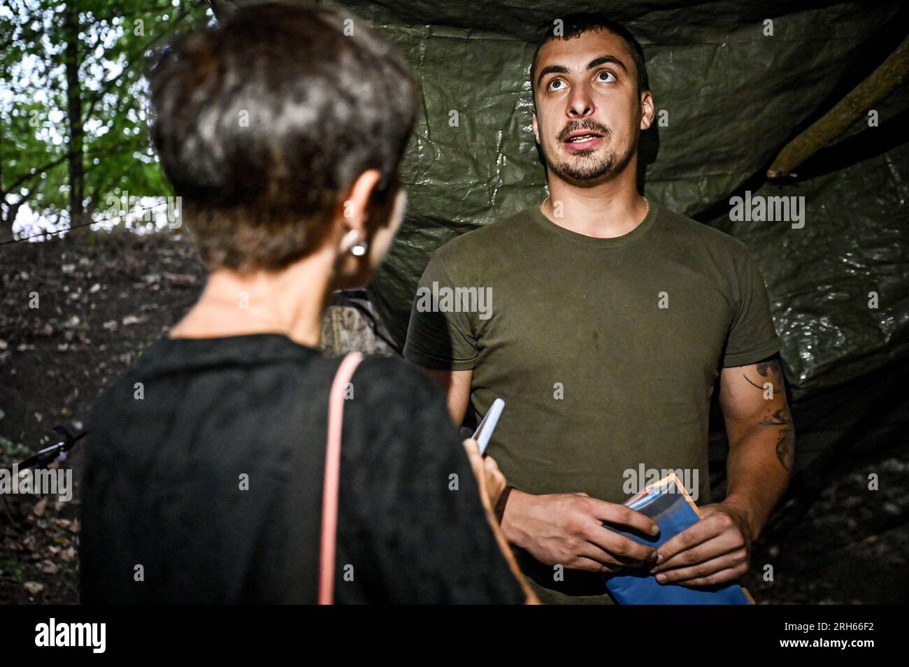 UKRAINE - AUGUST 11, 2023 - A serviceman gives an interview to an ...