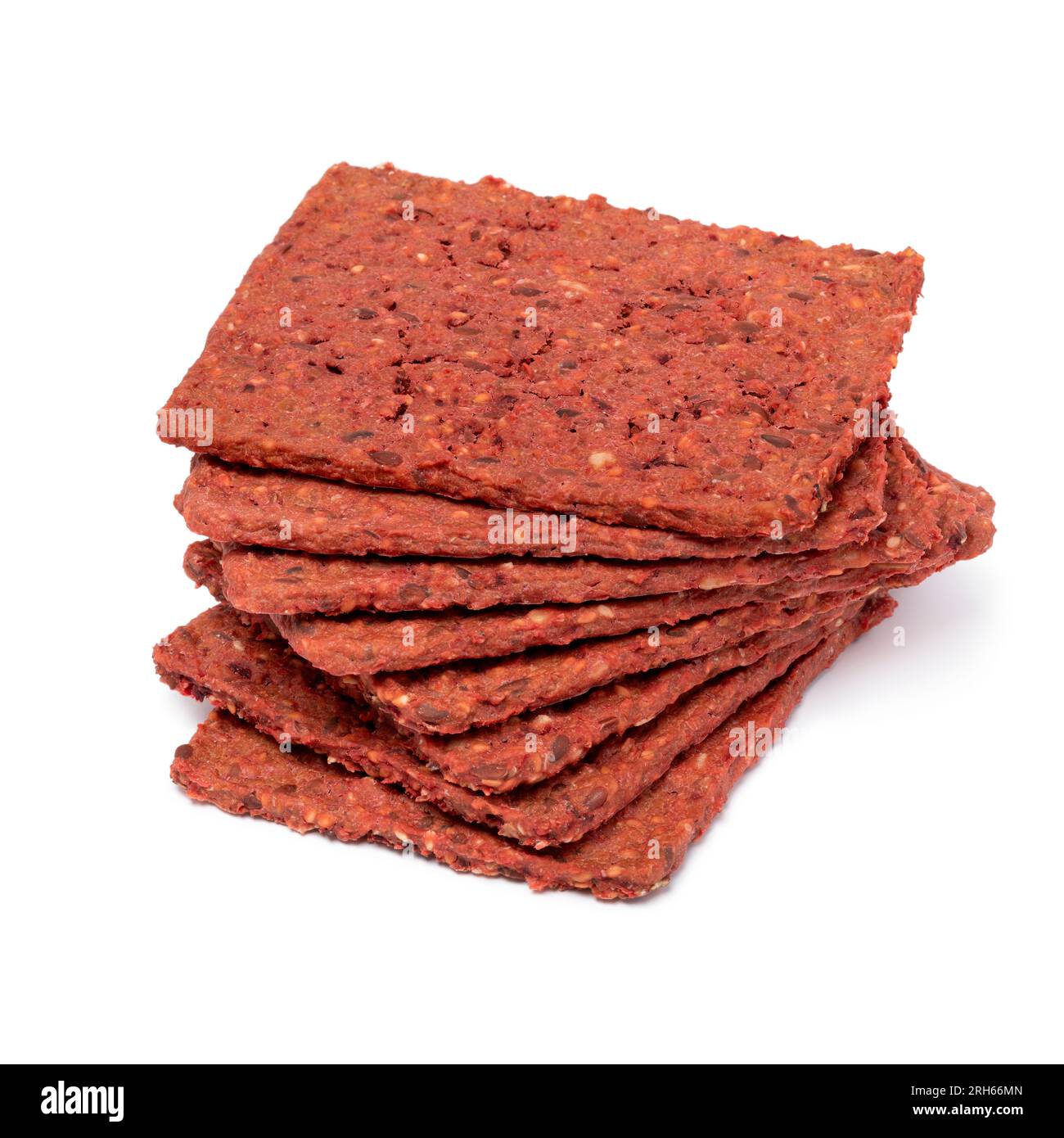 Heap of vegetable crackers seasoned with red beets isolated on white ...