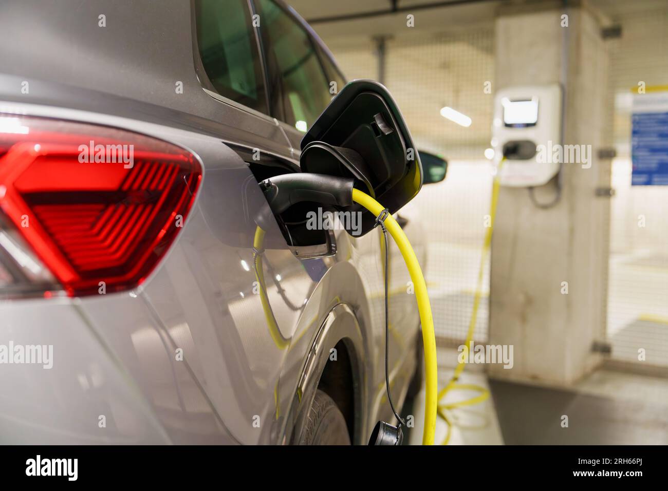Recharging electric cars at the charging station in the underground ...